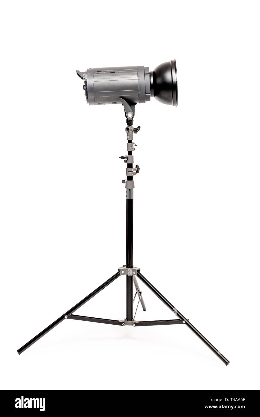 side view powerful photo flash on rack on a white background in the ...