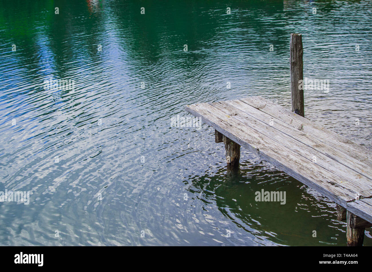lake with fresh and clean spring water and small wooden pier Stock ...