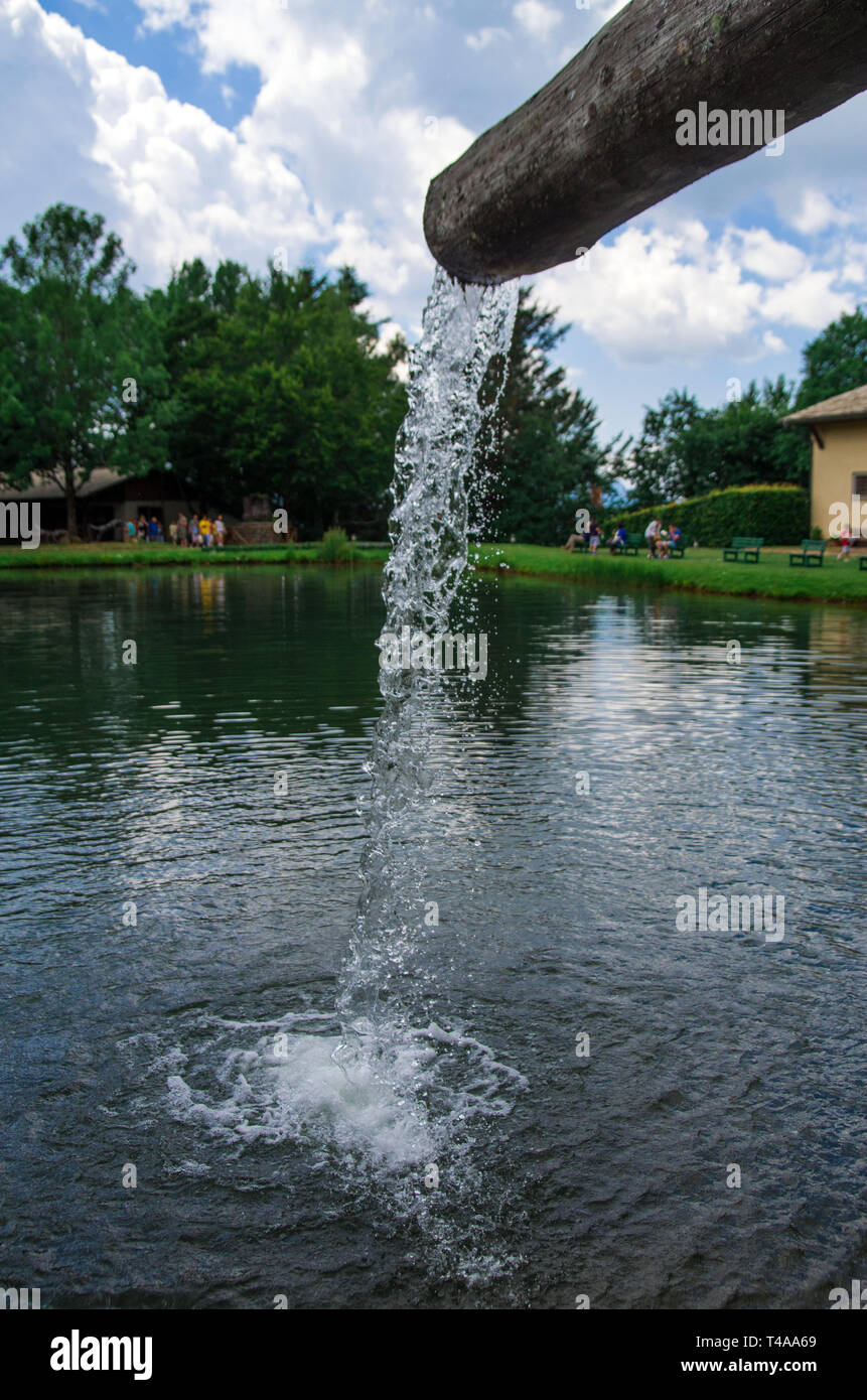 water source of life flows fresh and clean from the mountain to the ...