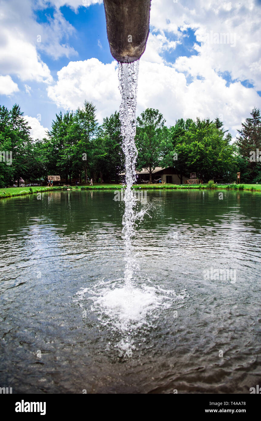 water source of life flows fresh and clean from the mountain to the ...