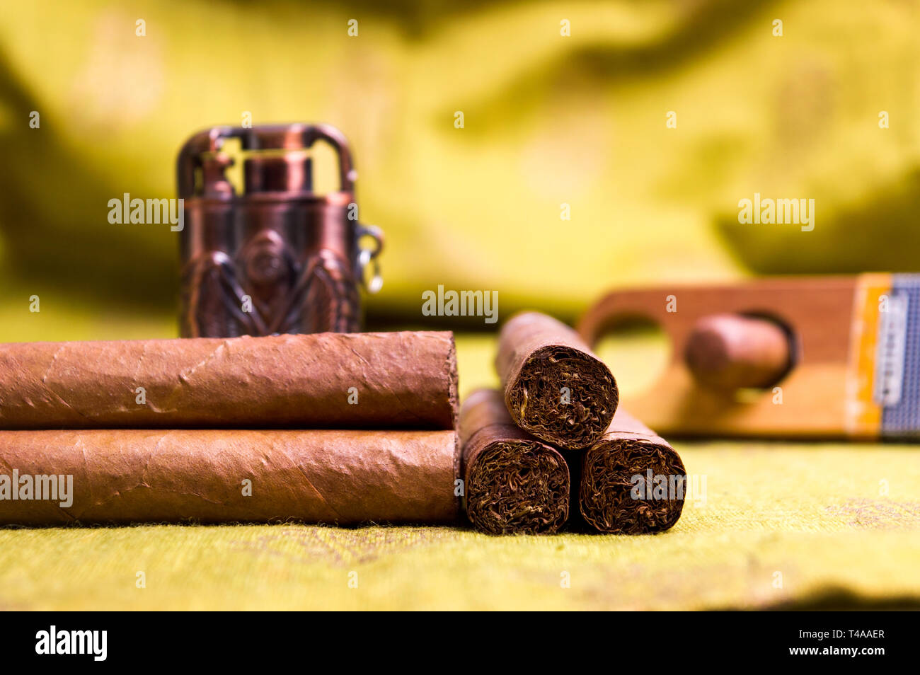 Bunch of Cuban cigars on a table Stock Photo - Alamy