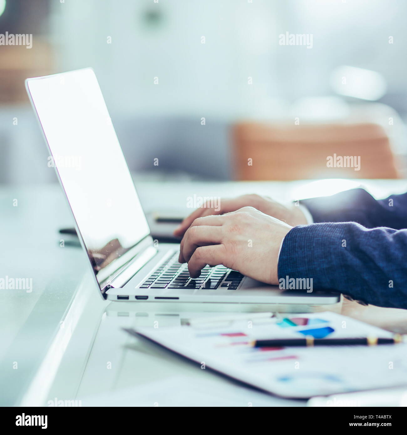 closeup - financial managers working on laptop with financial data at ...