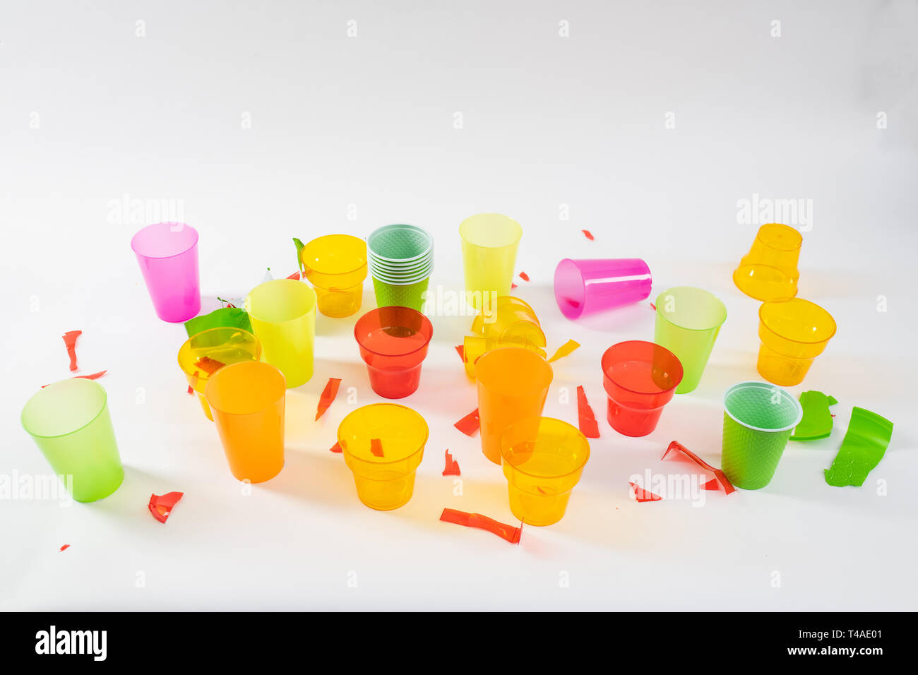 Bunch of colorful plastic cups being broken and thrown Stock Photo - Alamy