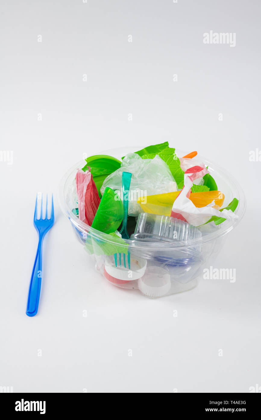Clear transparent container filled with trash and garbage Stock Photo ...