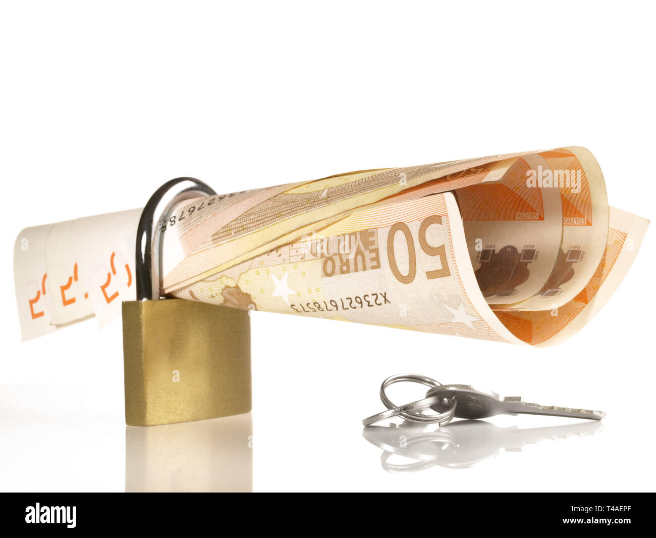 Money - Metall Lock with a Key on white Background Stock Photo - Alamy