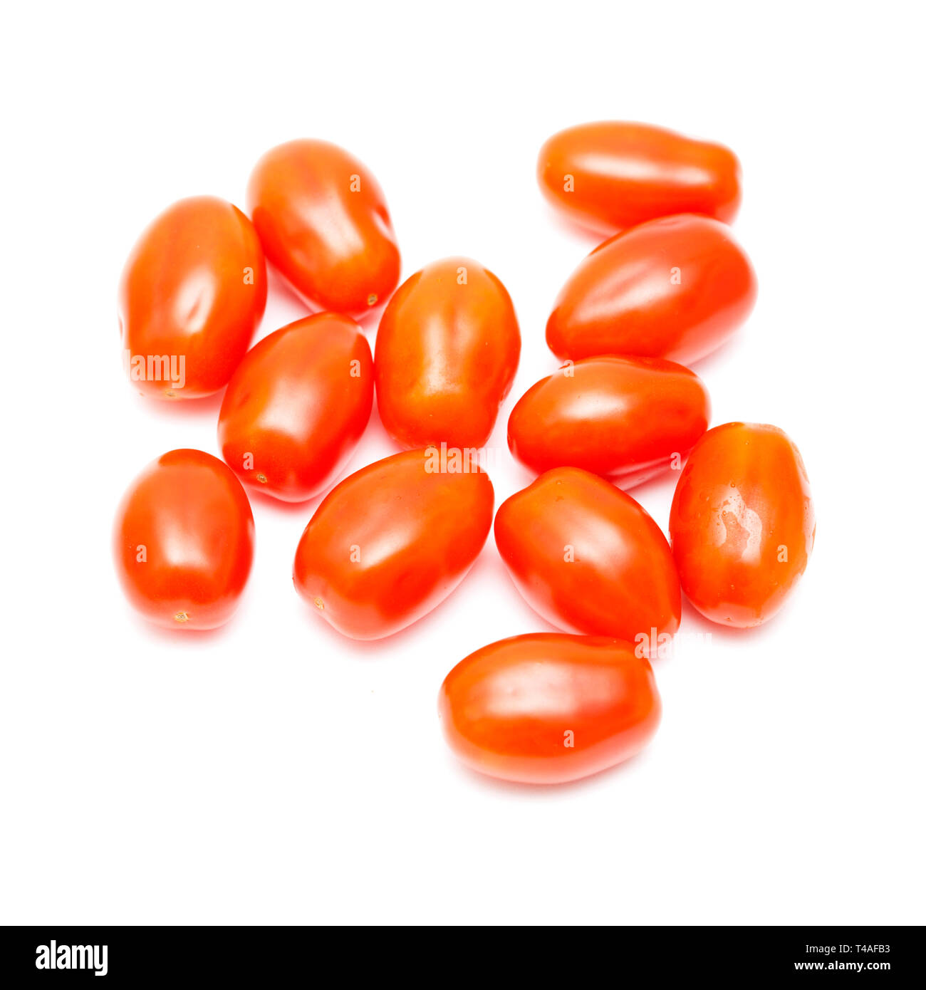 mini plum tomatoes isolated on white background Stock Photo - Alamy