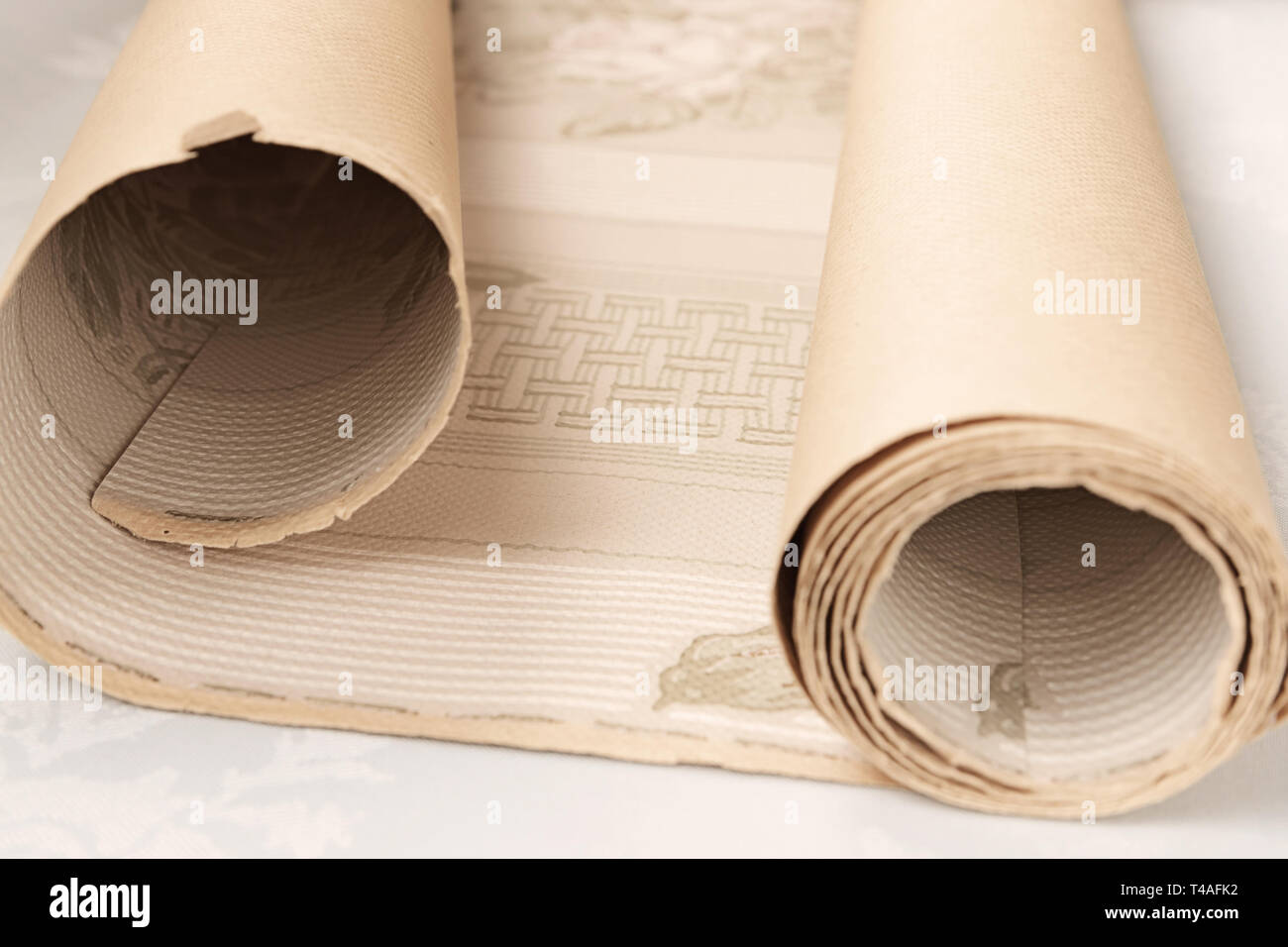 Antique wallpaper roll Stock Photo - Alamy