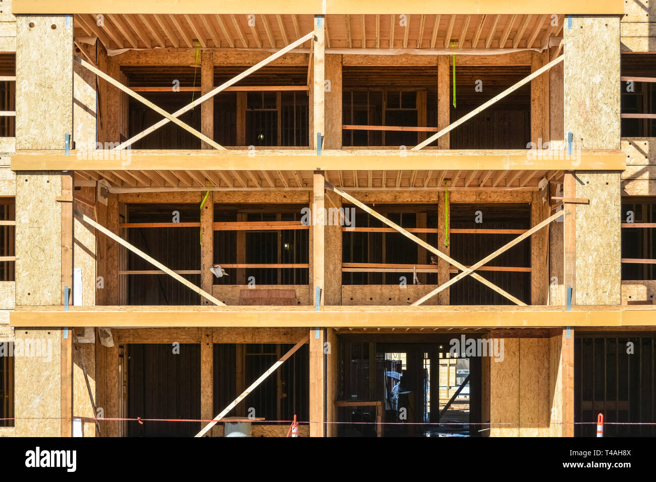 Wooden framework of brand new low-rise building on sunny day Stock ...