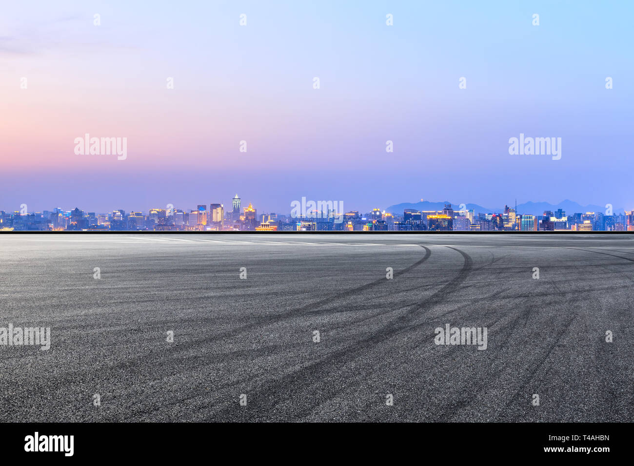 Asphalt race track ground and beautiful city scenery in Hangzhou at ...