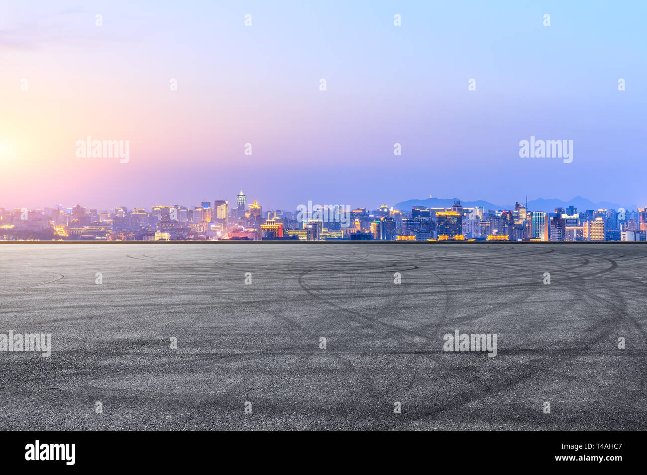 Asphalt race track ground and beautiful city scenery in Hangzhou at ...
