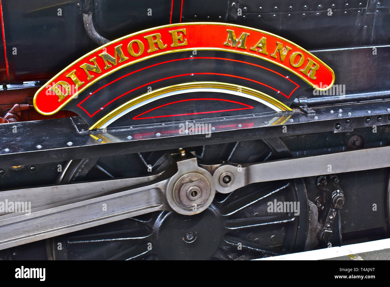 Close up detail of nameplate above one of main driving wheels of engine no. 7820, Dinmore Manor ...