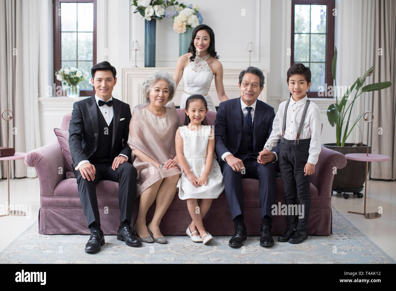 Portrait of happy noble family Stock Photo - Alamy