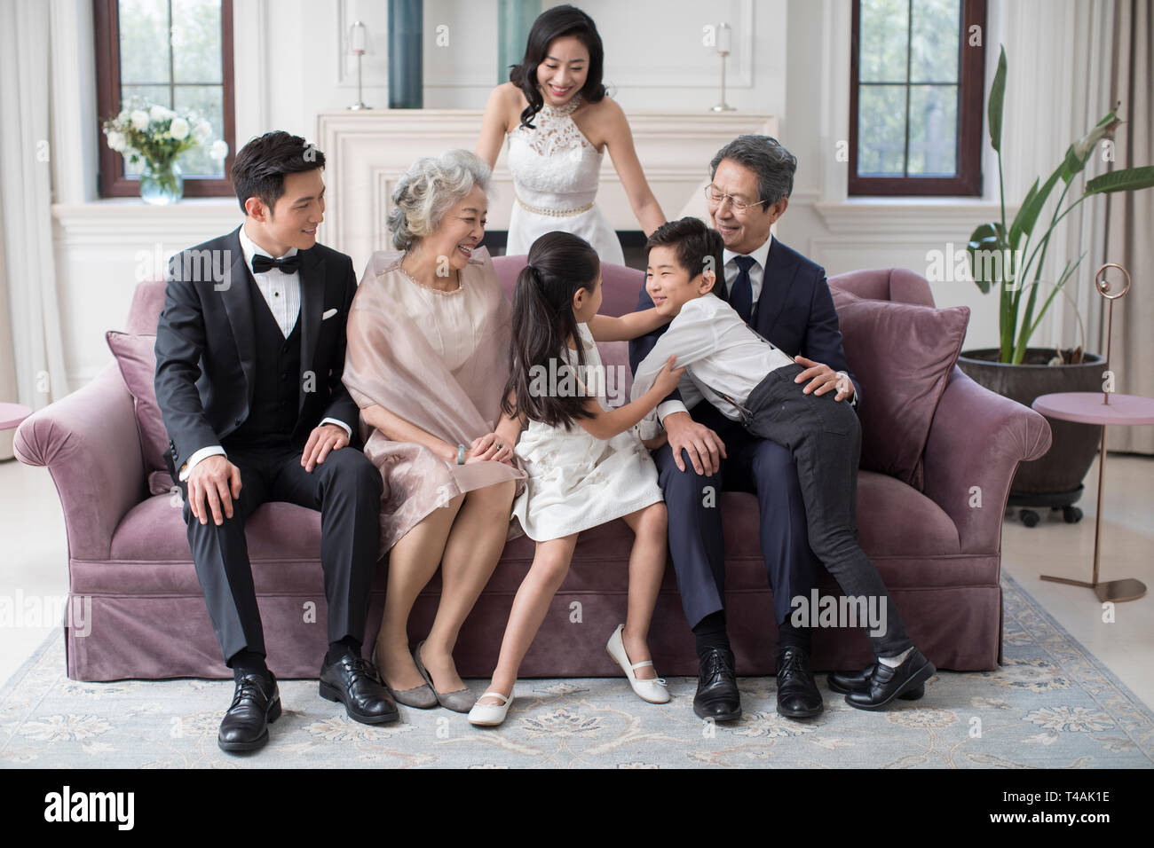 Portrait of happy noble family Stock Photo - Alamy