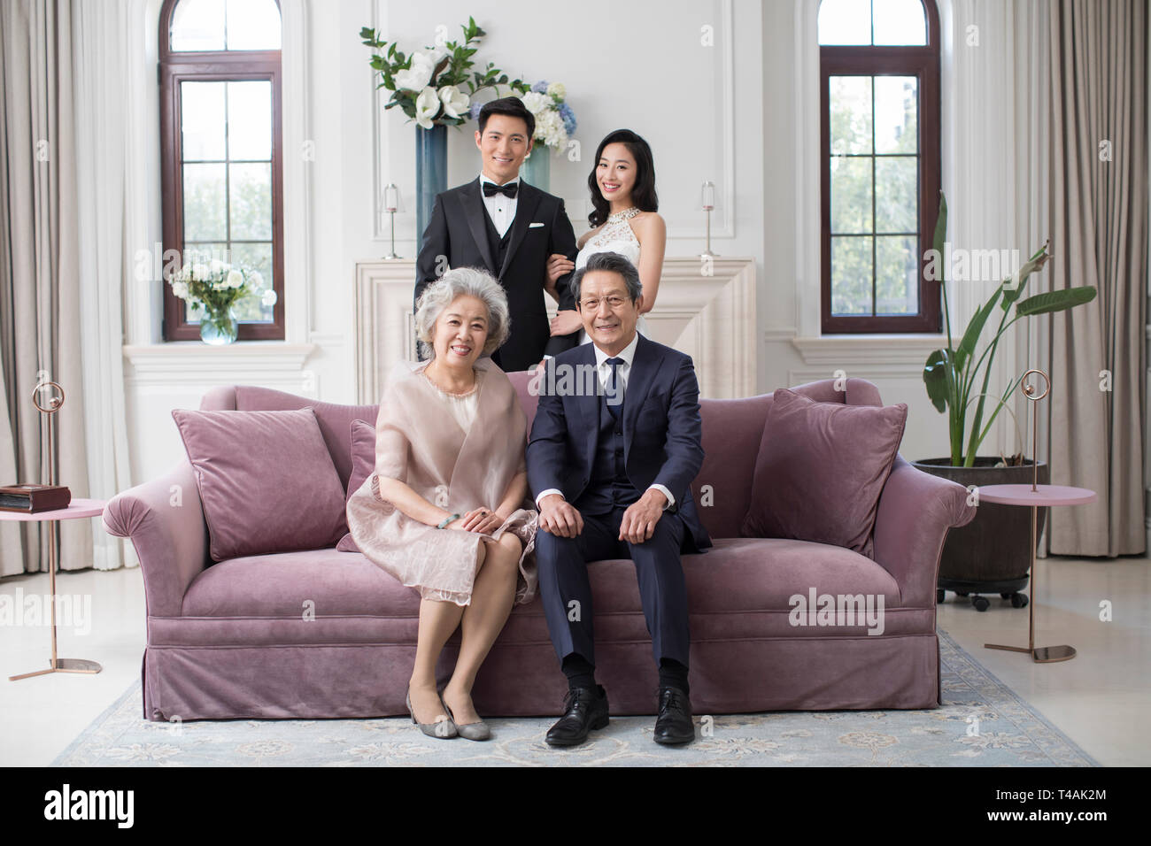 Portrait of happy noble family Stock Photo - Alamy