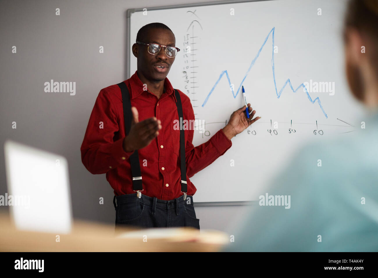 African Businessman Giving Presentation Stock Photo - Alamy