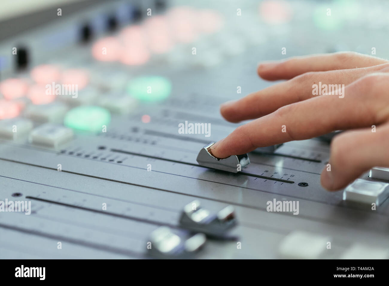Moderator and soundboard in radio broadcasting studio Stock Photo - Alamy