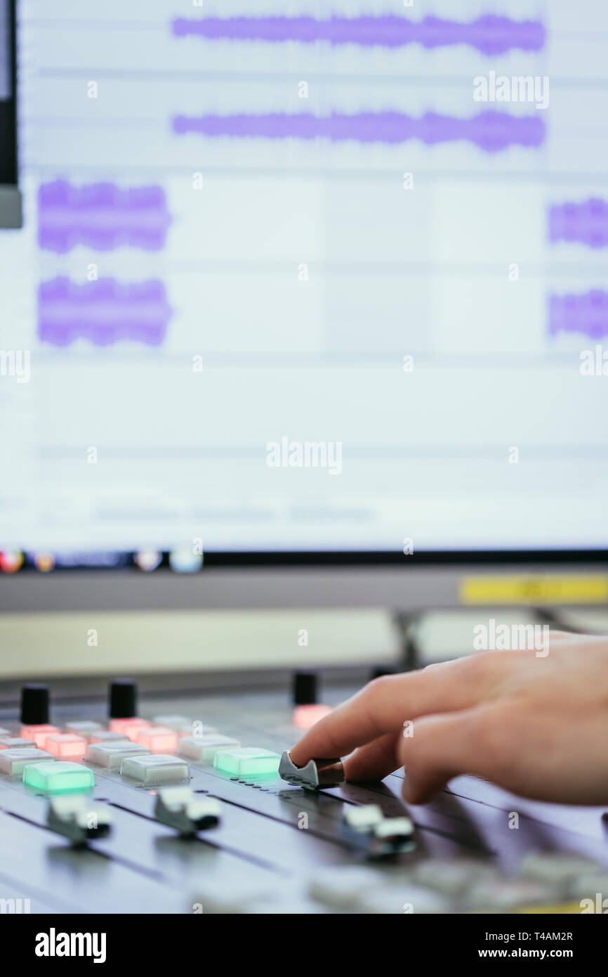 Moderator and soundboard in radio broadcasting studio Stock Photo - Alamy