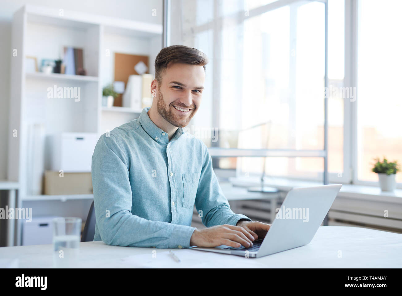 Successful handsome young adult hi-res stock photography and images - Alamy