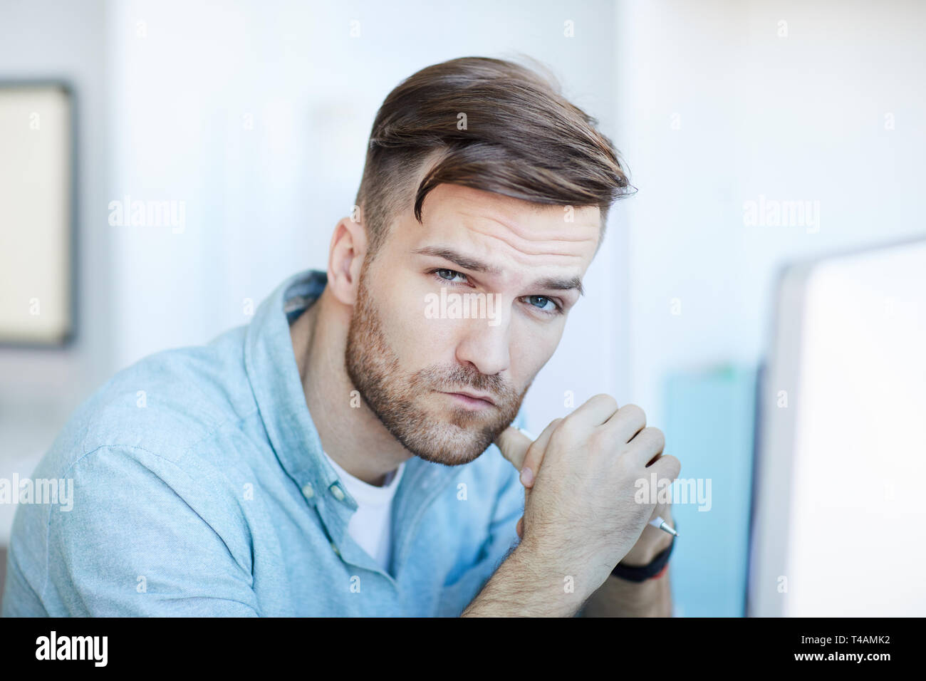 Handsome Man Looking at Camera Stock Photo - Alamy