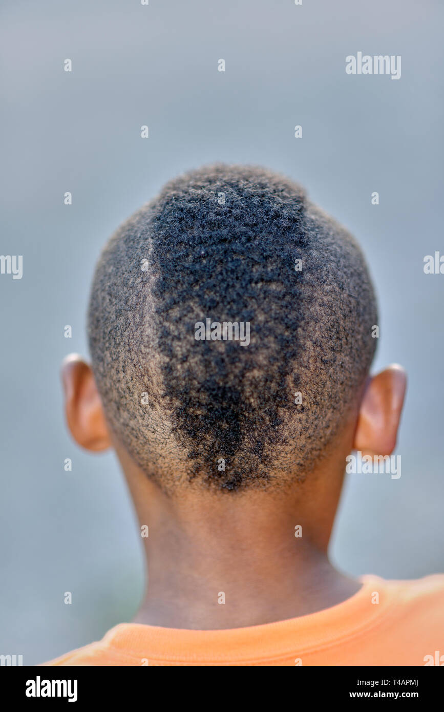 summer camper with mohawk hair cut Stock Photo - Alamy