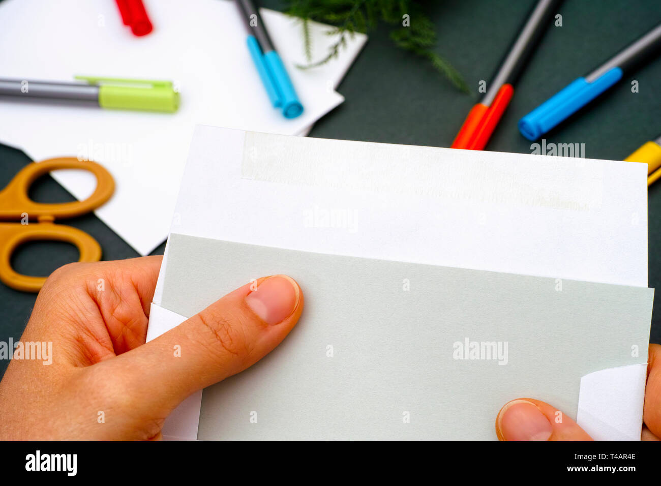 Hand Out Envelope High Resolution Stock Photography and Images - Alamy