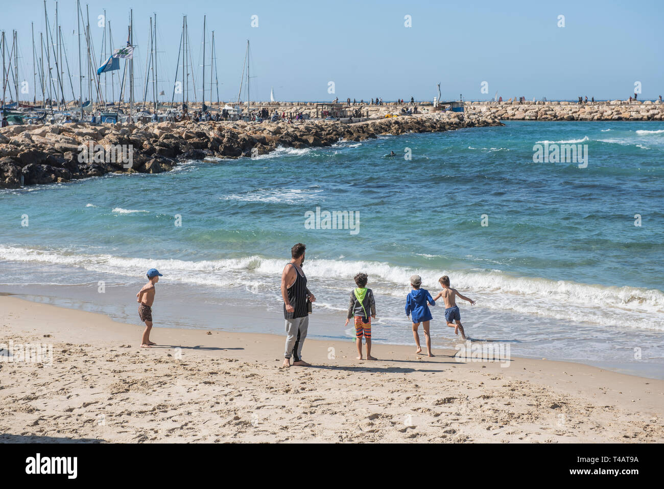 Kids playing on the beach hi-res stock photography and images - Alamy