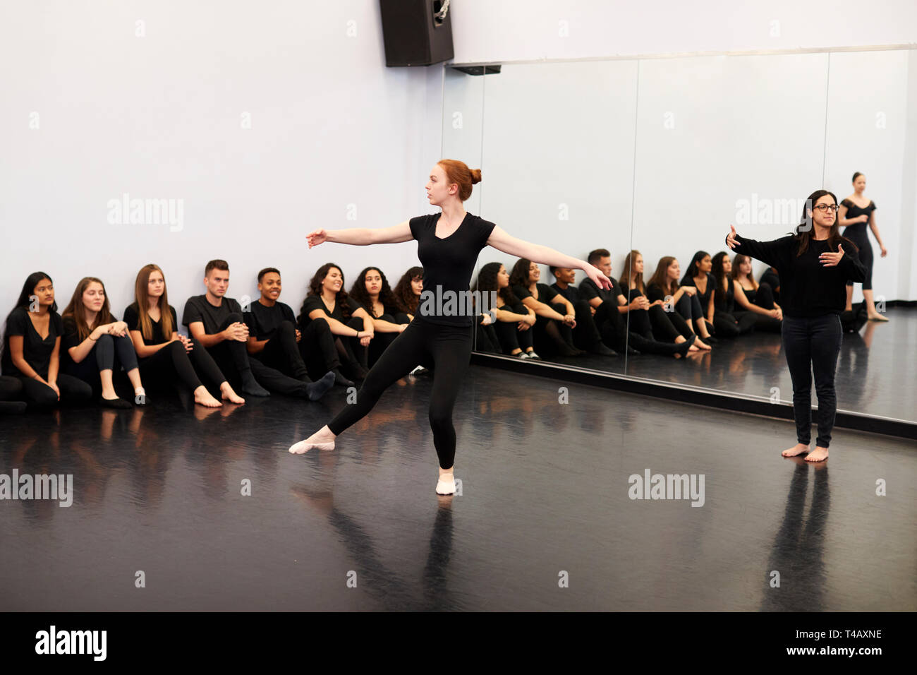 Female Ballet Student At Performing Arts School Performs For Class And ...