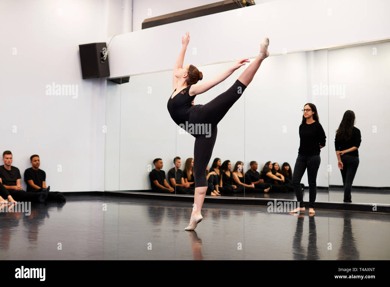 Female Ballet Student At Performing Arts School Performs For Class And ...