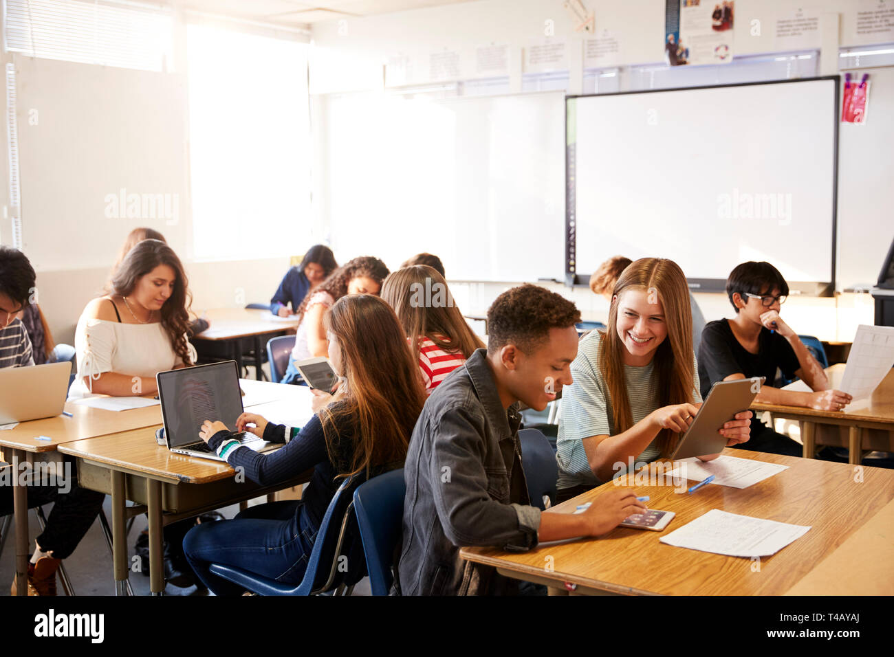 School education desks hi-res stock photography and images - Alamy