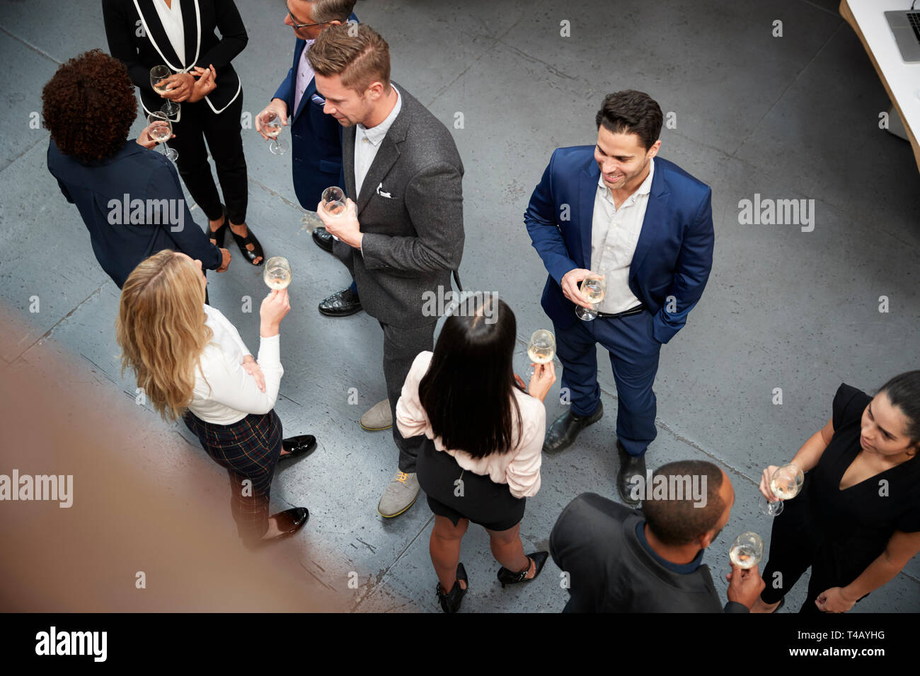 Overhead Shot Of Business Team Socializing At After Works Drinks In ...