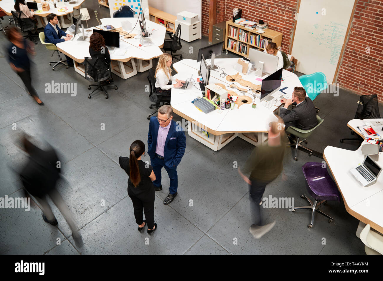 Overhead View Of Busy Modern Open Plan Office Stock Photo - Alamy