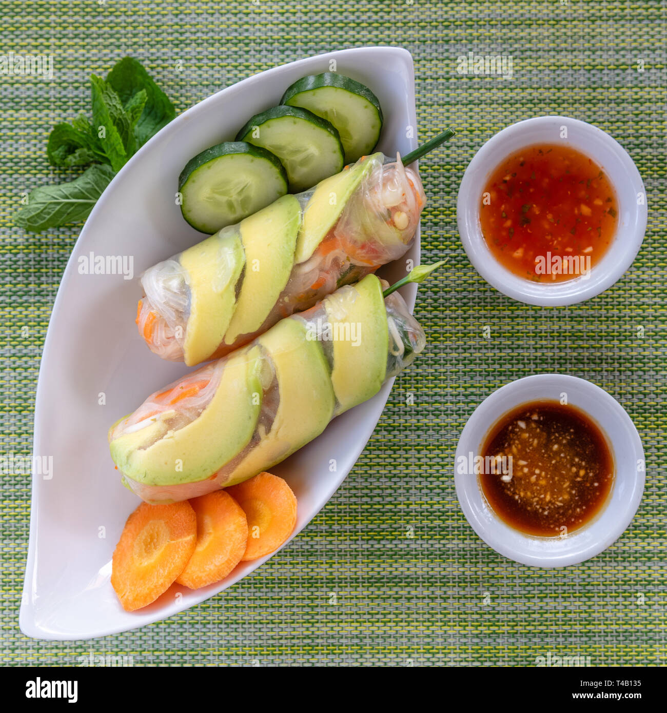 Vietnamese vegetarian spring rolls served with sauces Stock Photo - Alamy