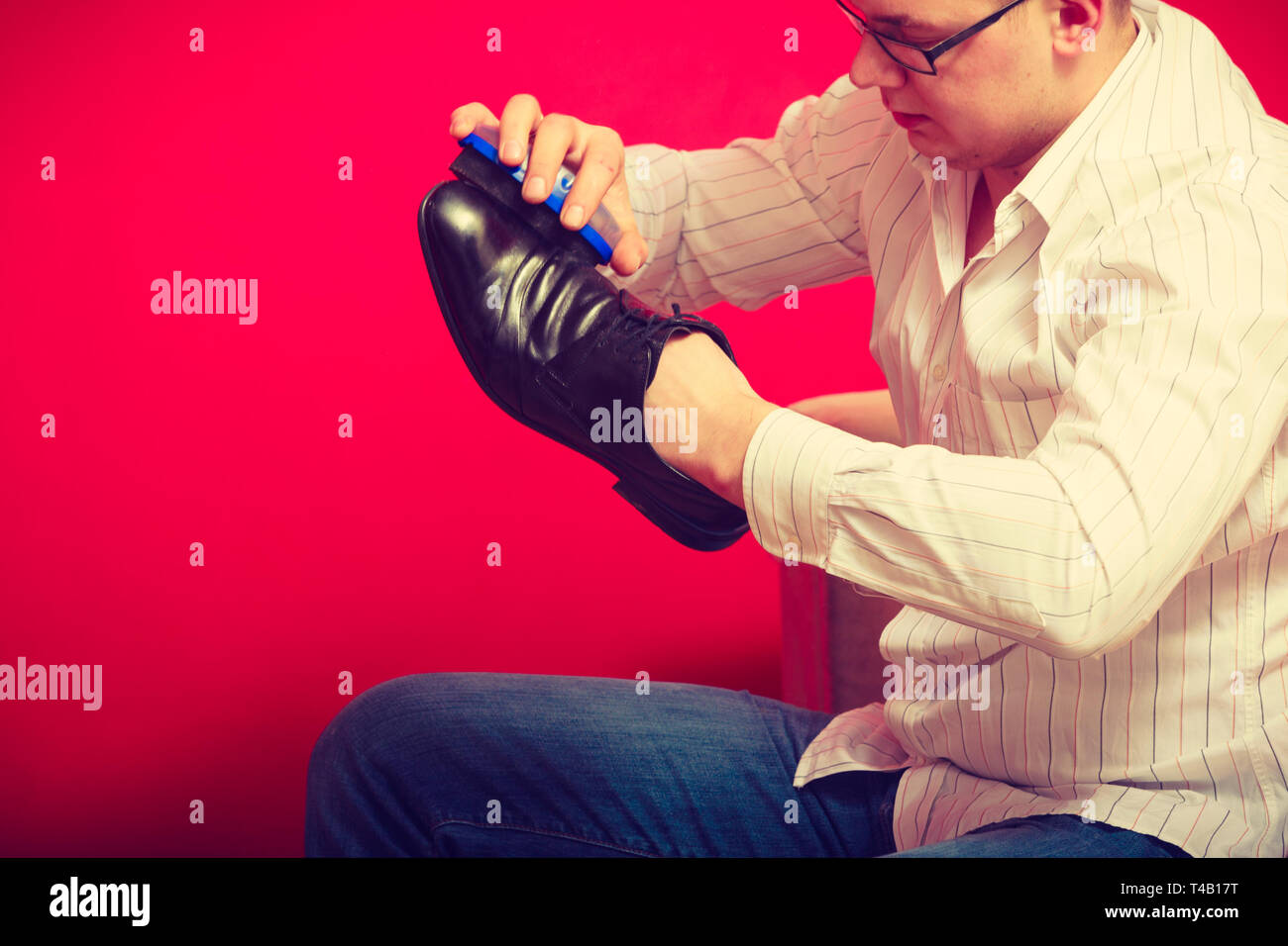 Footwear and man fashion, gentleman outfit concept. Guy cleaning and ...