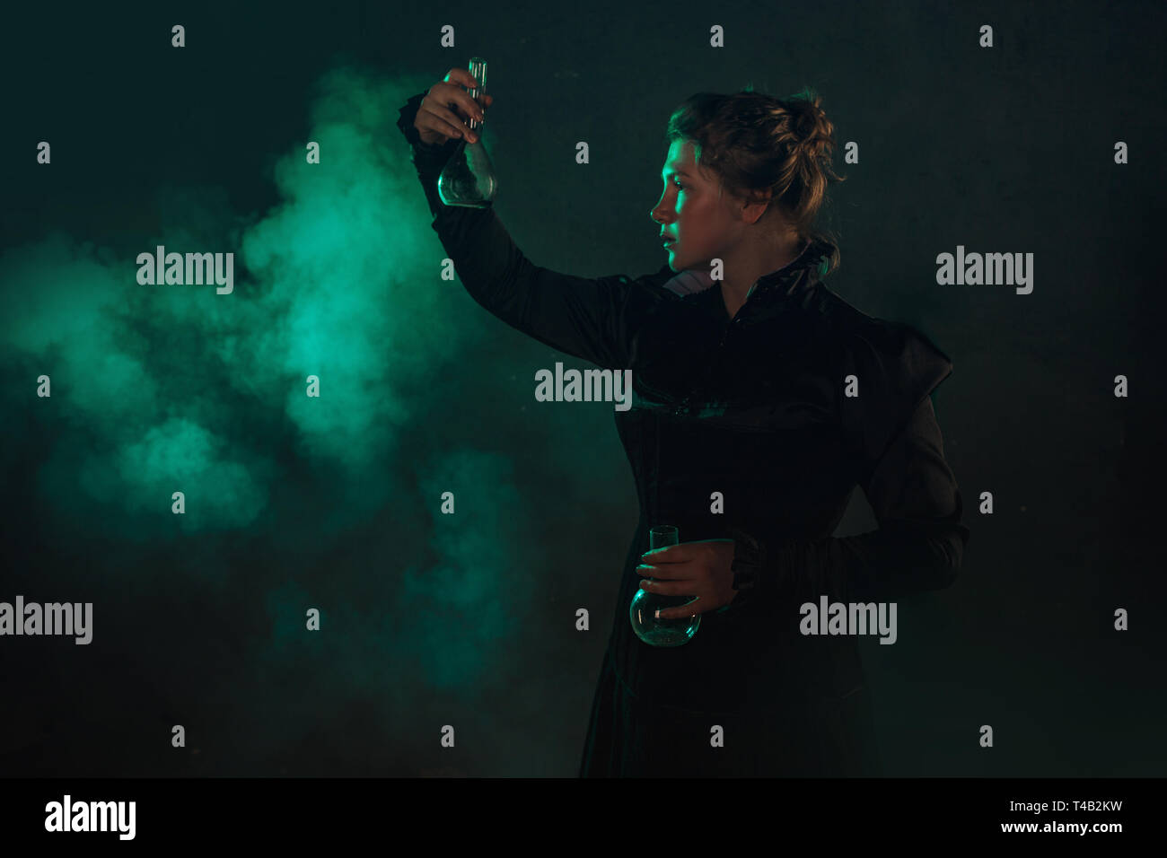 Scientist researcher with a flask of radioactive material. The study of ...