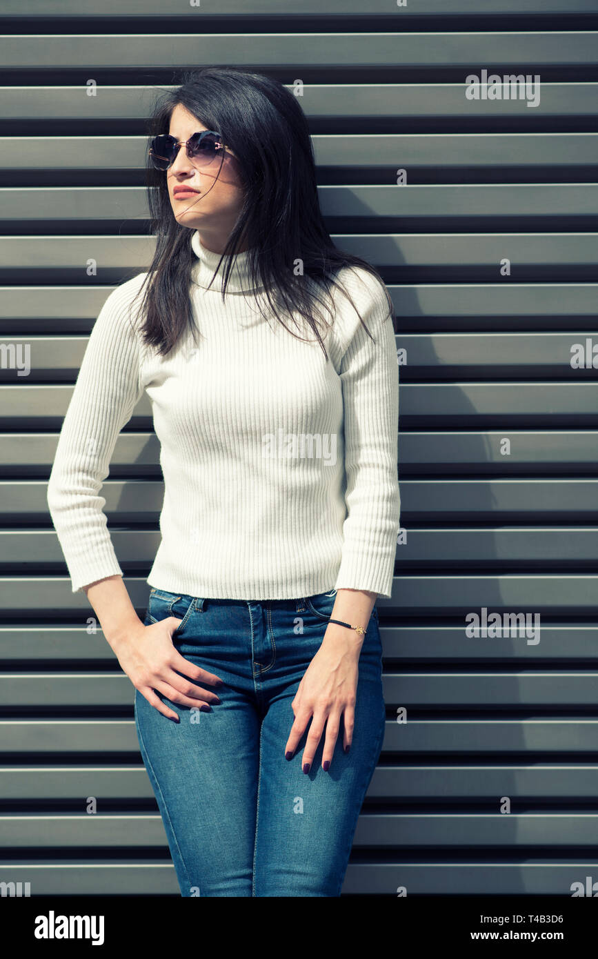 Beautiful woman standing outdoors Stock Photo - Alamy