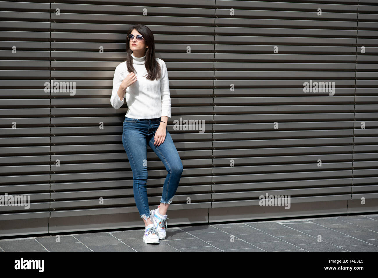 Beautiful woman standing outdoors Stock Photo - Alamy