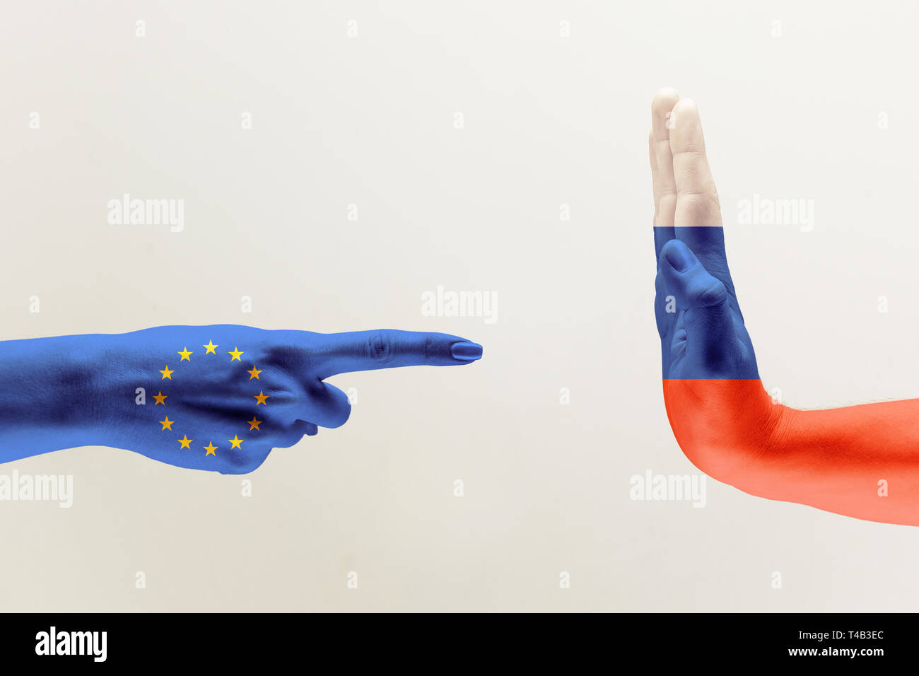 Confrontation, countries disagreement. Female and male hands colored in ...