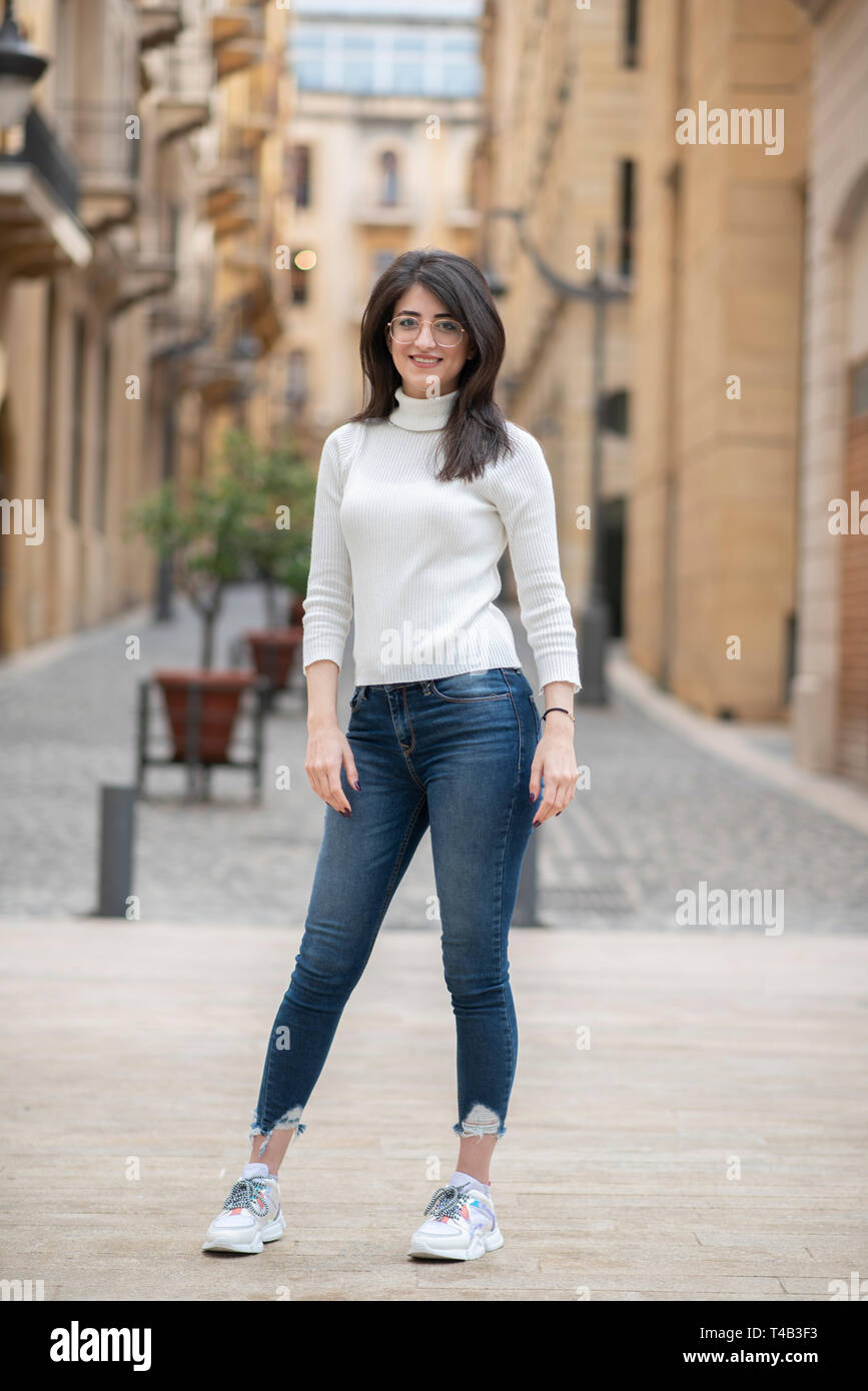 Beautiful woman standing outdoors Stock Photo - Alamy