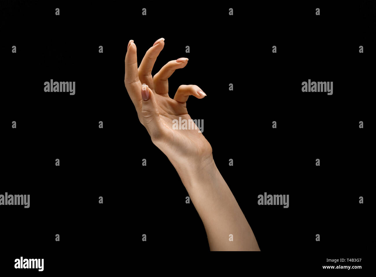 Touching of emptyness. Female hand demonstrating a gesture of getting ...