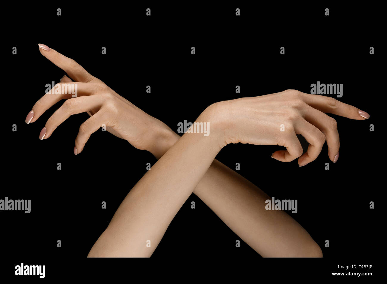 Choosing a right way. Male and female hands demonstrating a gesture of ...