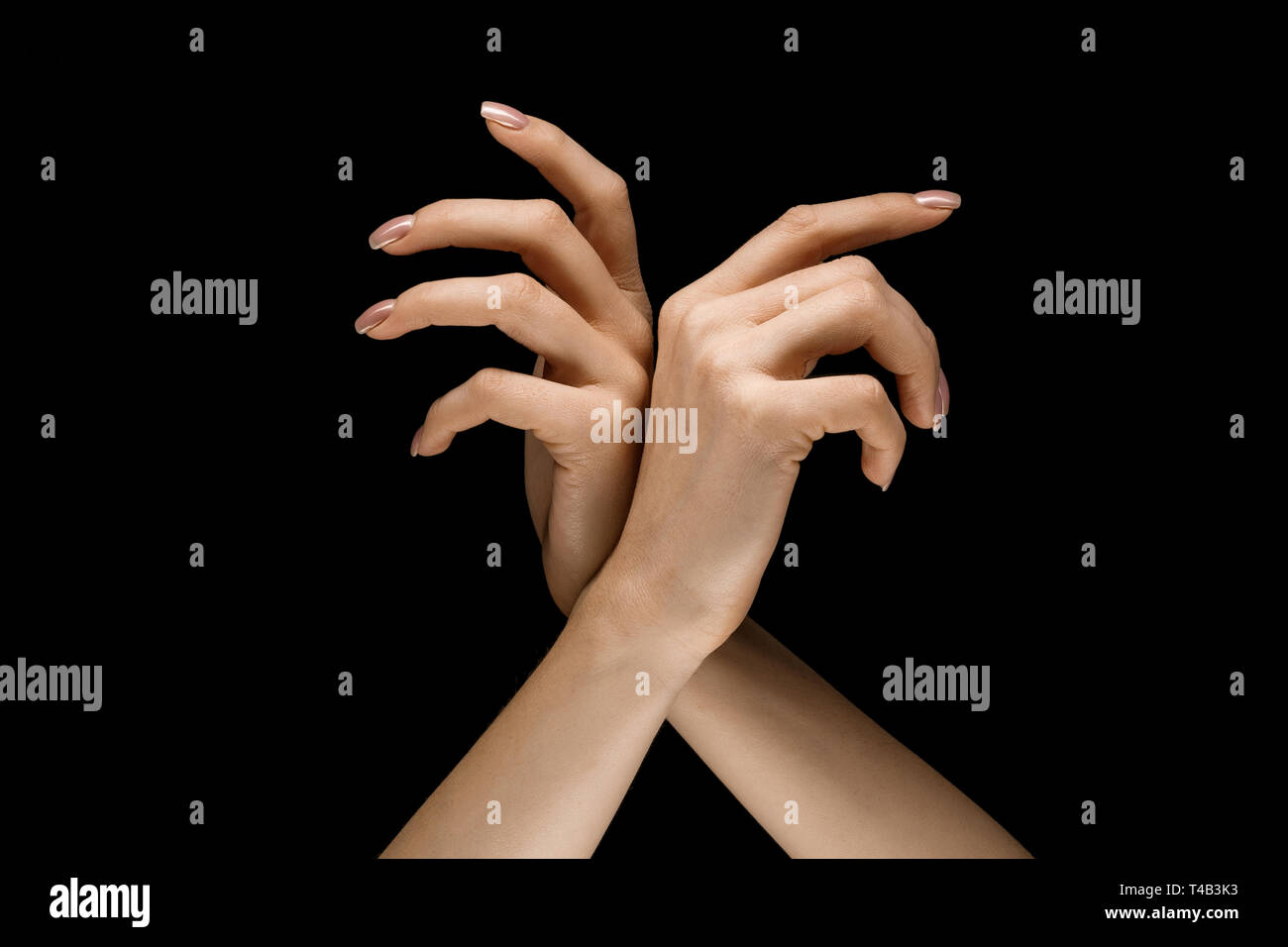 Choosing a right way. Male and female hands demonstrating a gesture of ...