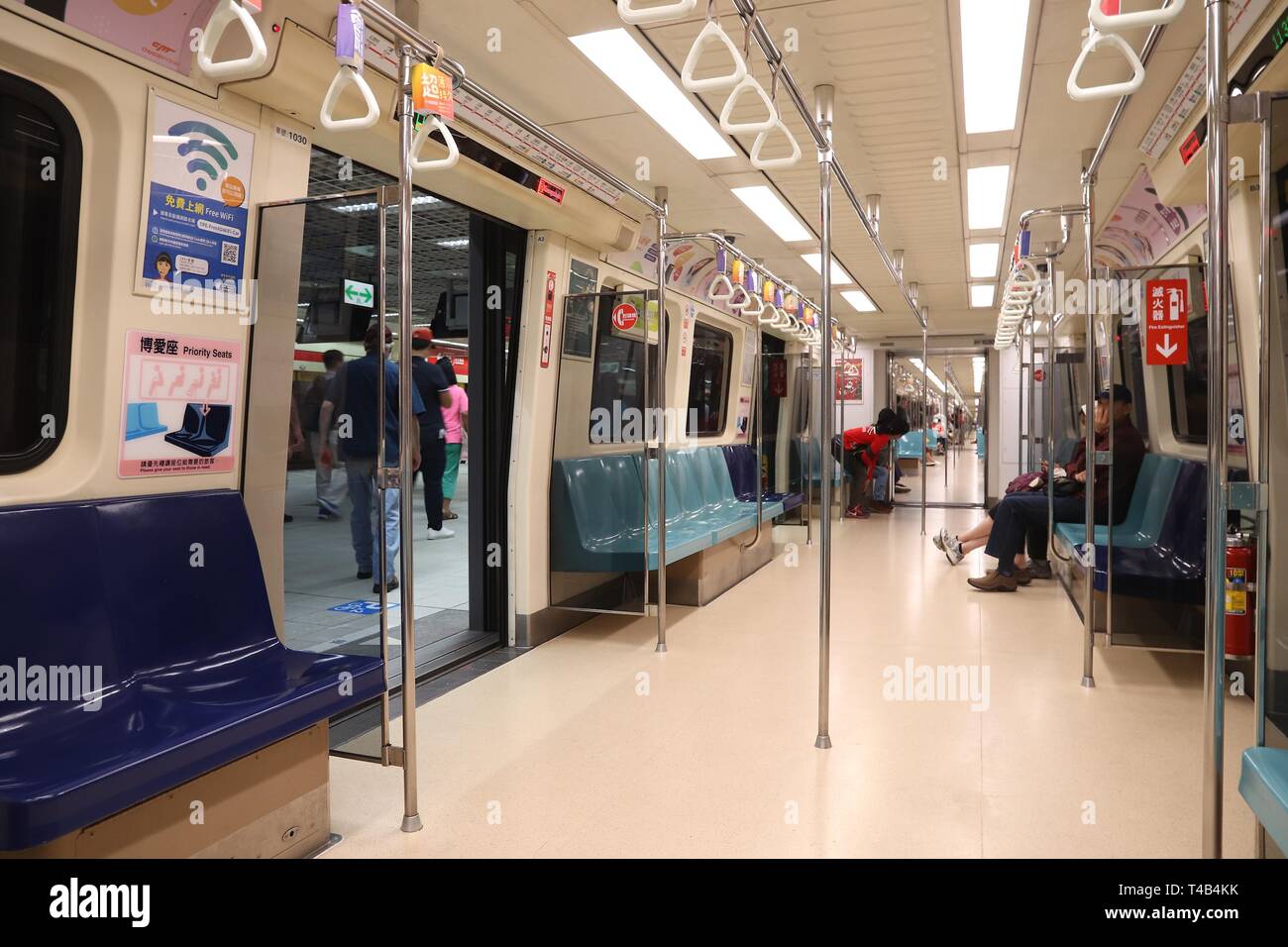 TAIPEI, TAIWAN - DECEMBER 3, 2018: People ride a Metro train in Taipei ...