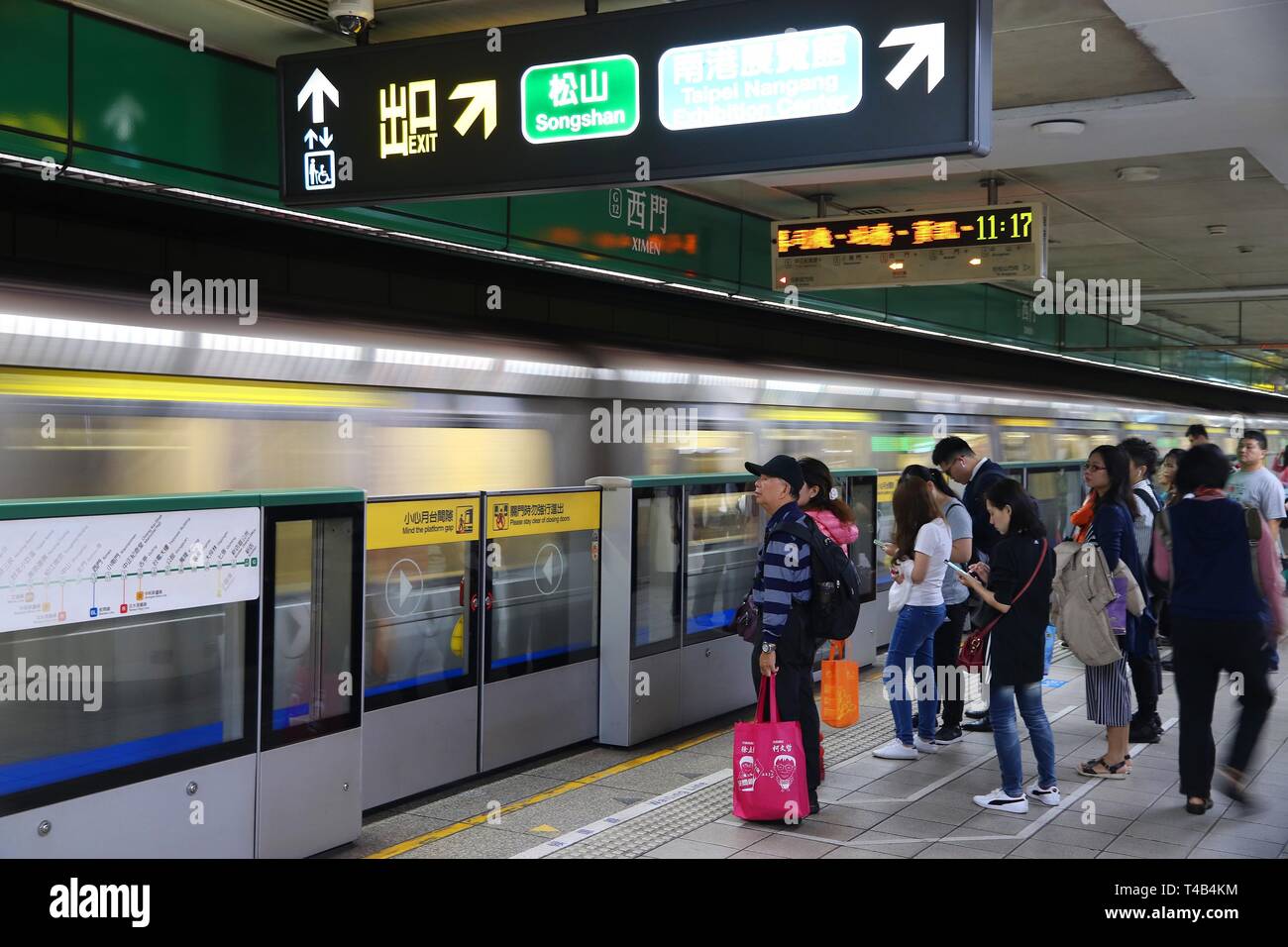 TAIPEI, TAIWAN - DECEMBER 4, 2018: People wait for a Metro train in ...