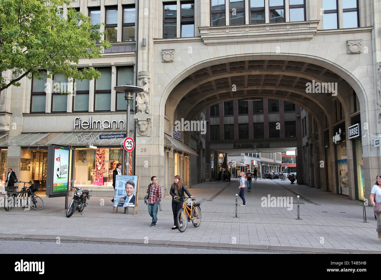 HAMBURG, GERMANY - AUGUST 28, 2014: People visit Rathausmarkt, the main ...