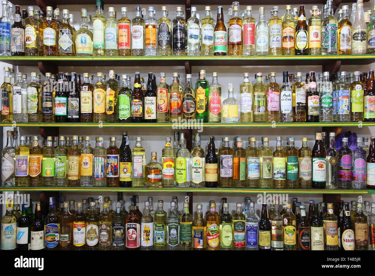PARATY, BRAZIL - OCTOBER 14, 2014: Cachaca alcohol bottles collection ...