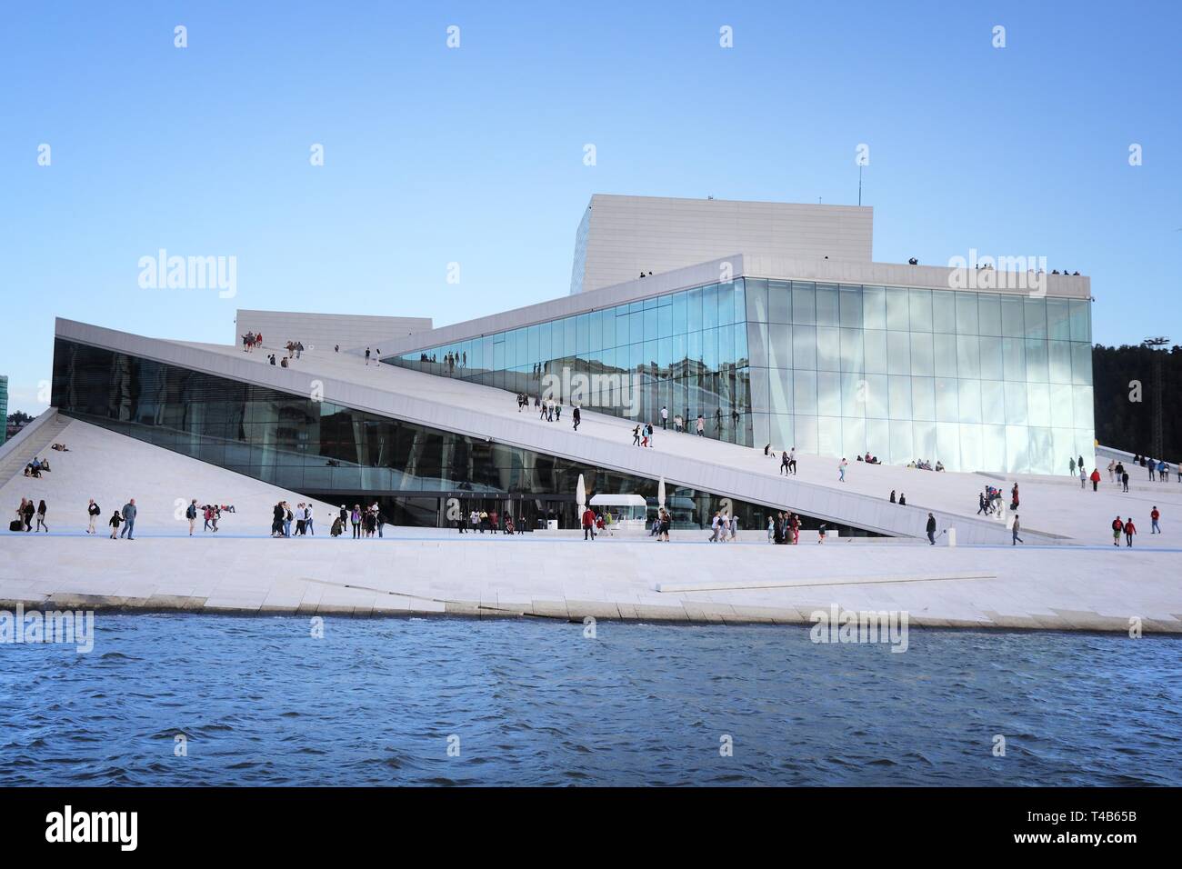 OSLO, NORWAY - AUGUST 2, 2015: People visit Oslo Opera House in Norway ...