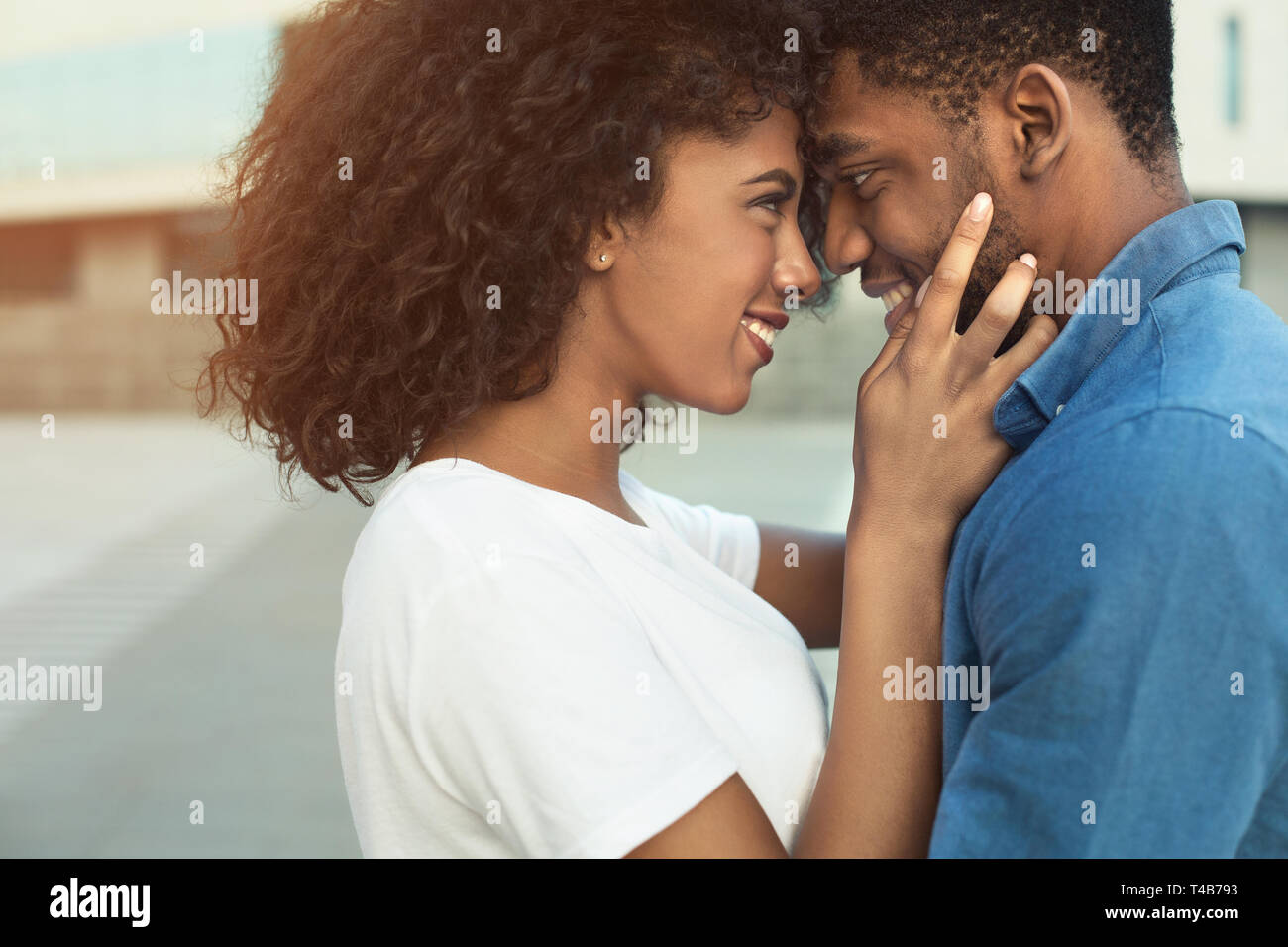 Happy together. Serene couple bonding to each other Stock Photo - Alamy