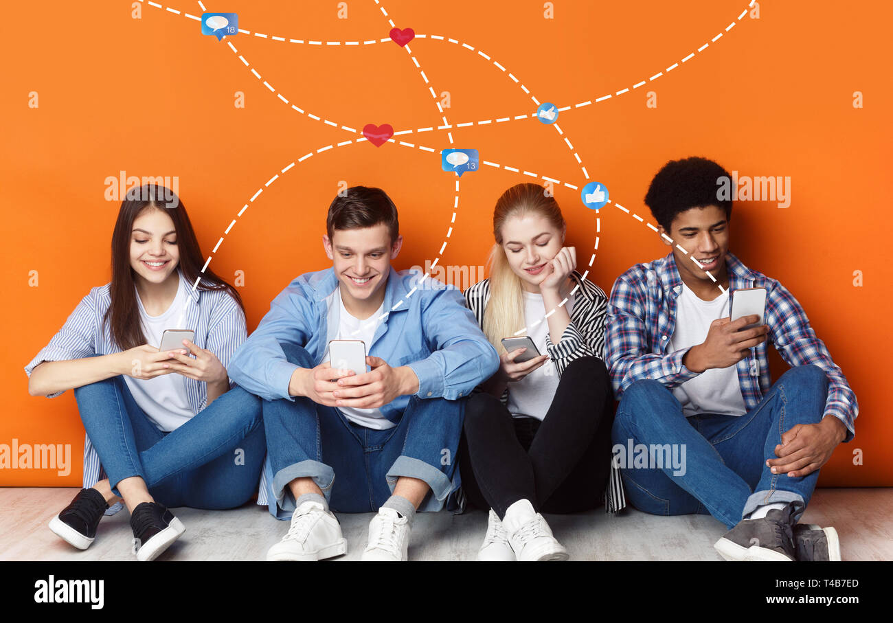 Friends chatting in social networks, using phones Stock Photo - Alamy