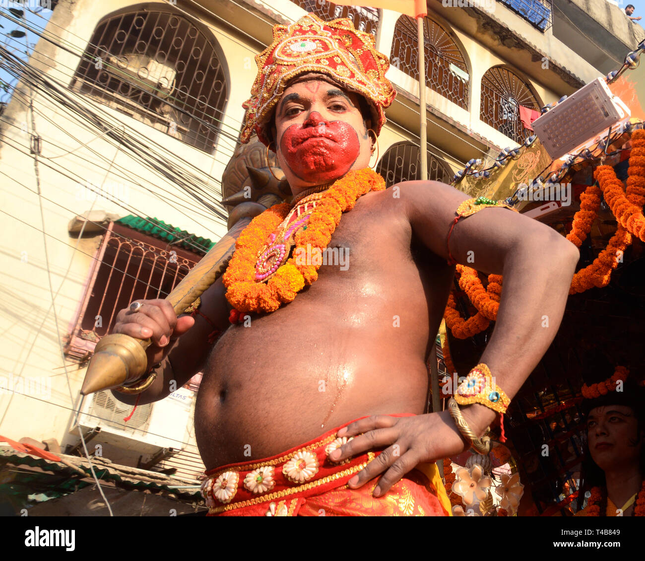 Kolkata, India. 14th Apr, 2019. Hindu man in Lord Hanuman attire take part in the religious ...