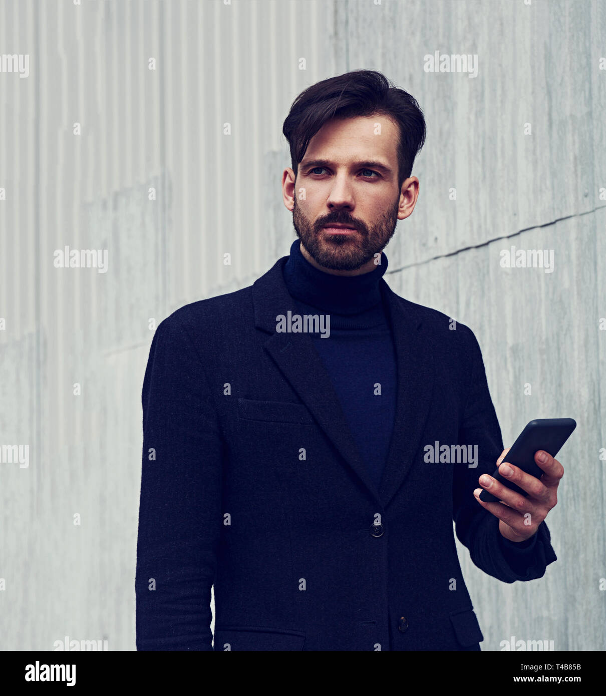 Fashion beard style business handsome male model working and calling on ...